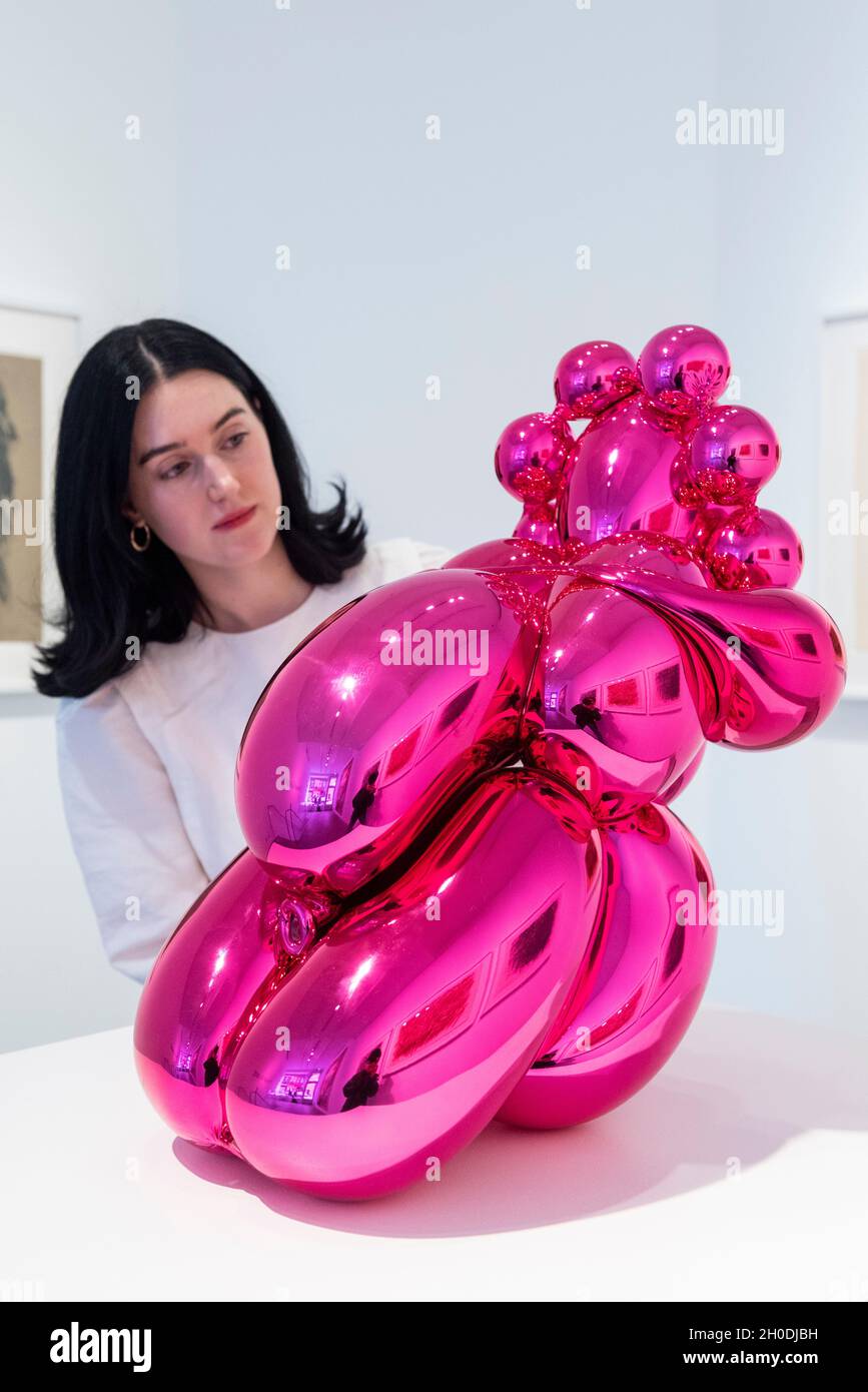 London, UK. 12 October 2021. A staff member views "Dom Pèrignon Balloon ...