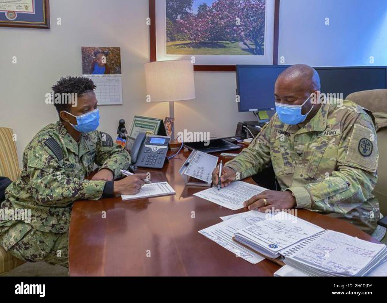 Navy Capt. Jamesetta Goggins (left) and Army Col. Clausyl “C.J ...