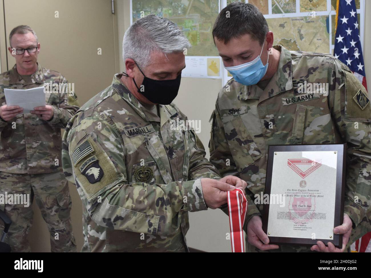 While MAJ John Zook overlooks the presentation script, Sergeant Major ...