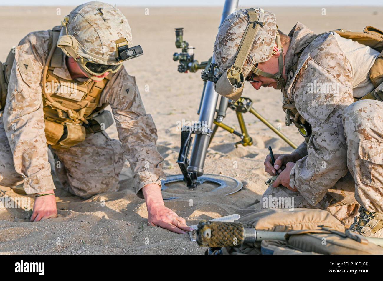 U.S. Marine Corps Lance Cpl. Dylan Warax, left, and Lance Cpl. Colin ...