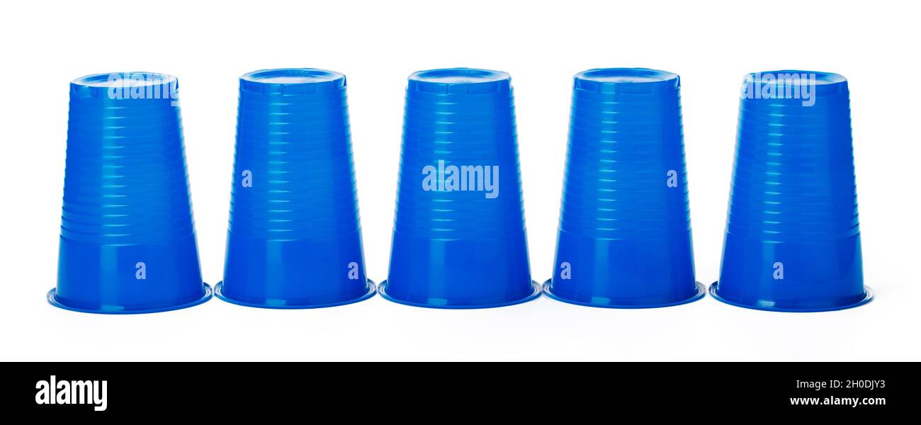 Pile of plastic cups on white background Stock Photo - Alamy