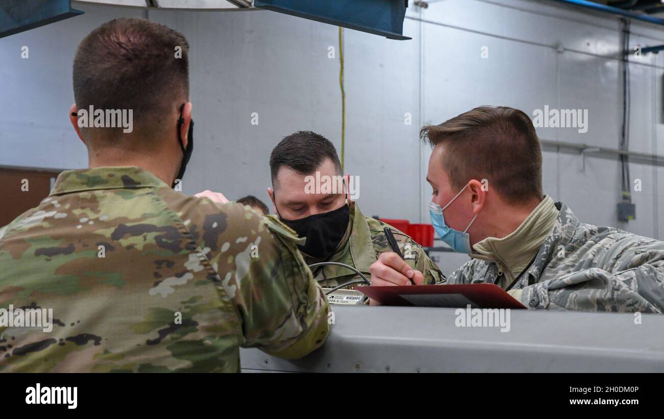 An Airman from the 2nd Munitions Squadron explains the process for ...