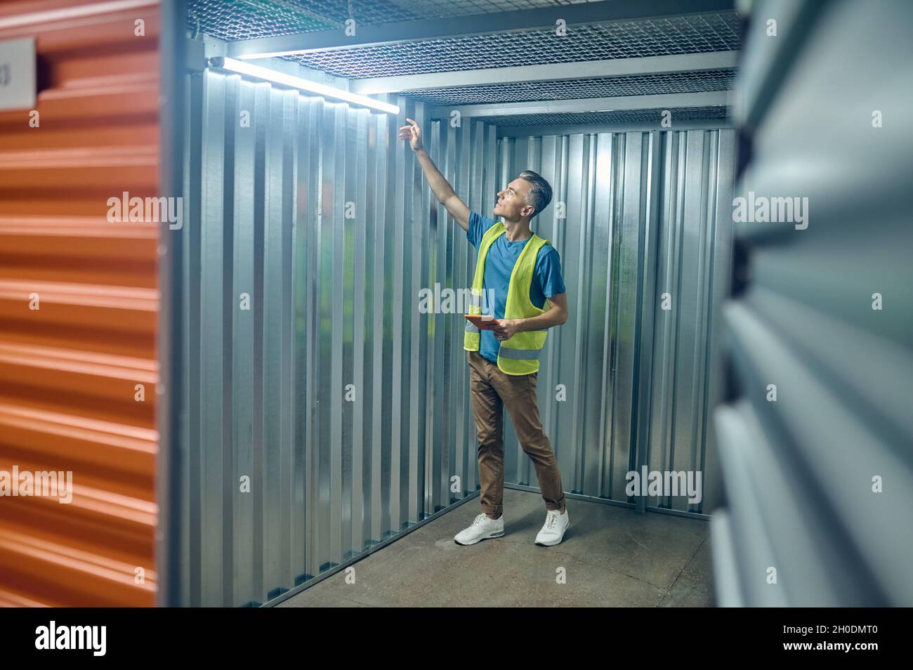 Man with lamp hi-res stock photography and images - Alamy