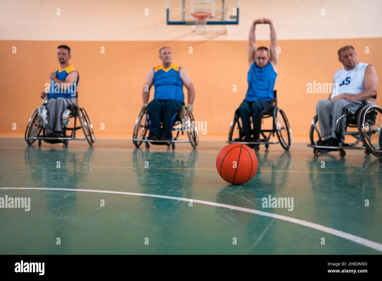 a photo of basketball teams with disabilities with the selector in the ...