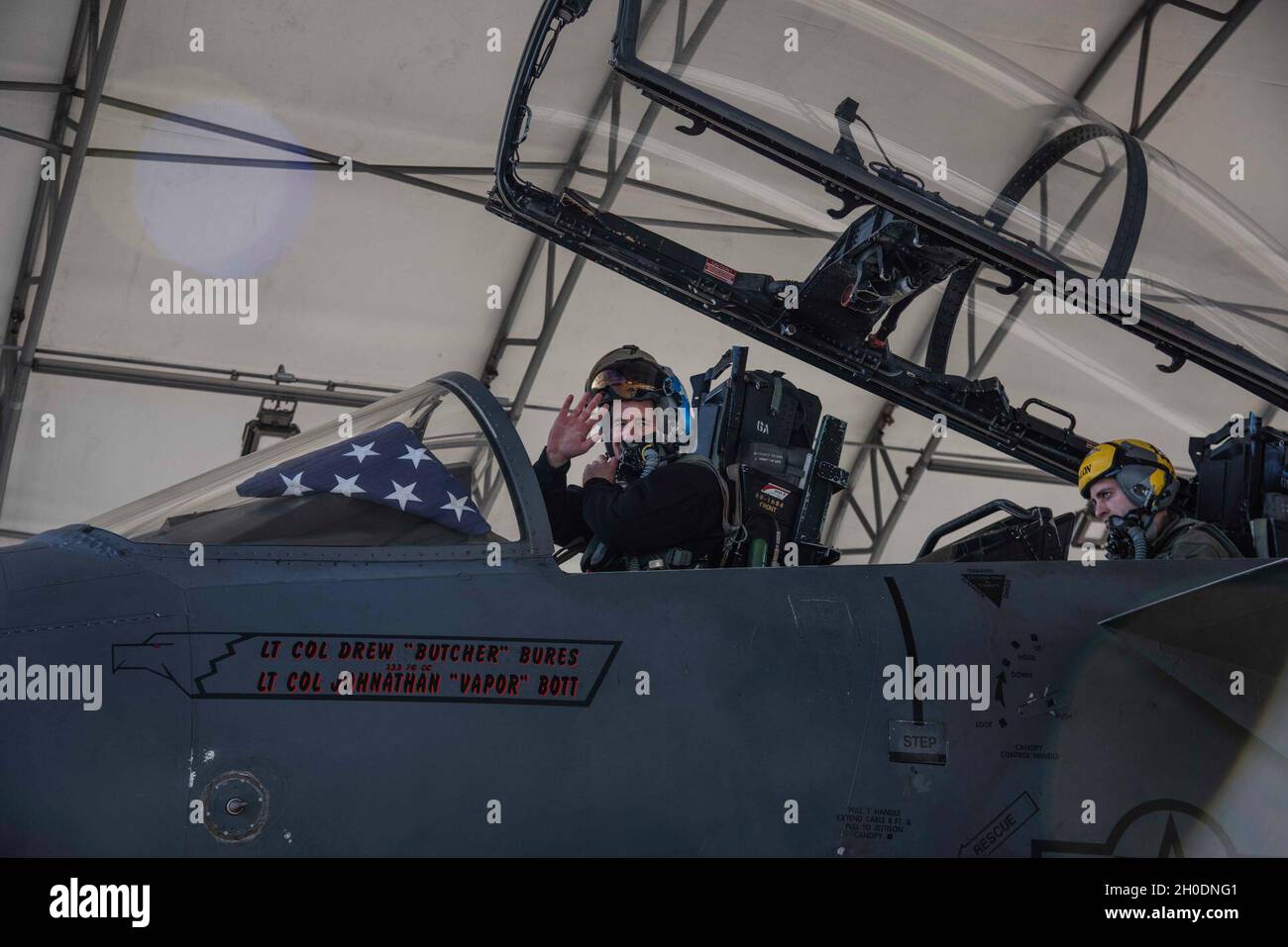 Col. Aaron Meyers, 4th Operations Group commander, waves to his family ...