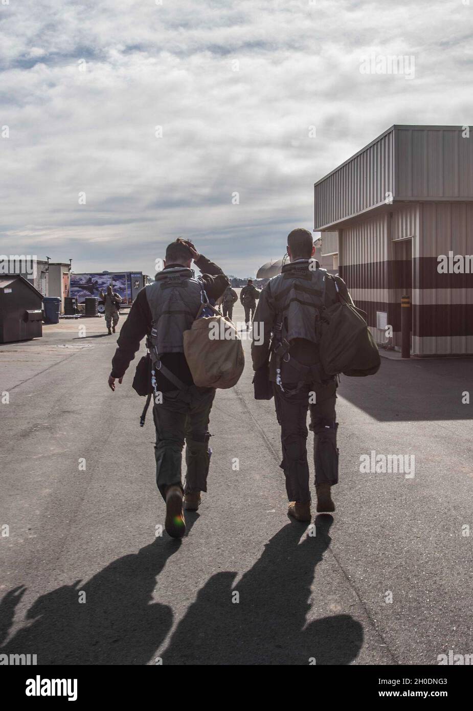 Col. Aaron Meyers, 4th Operations Group commander, receives a pre ...
