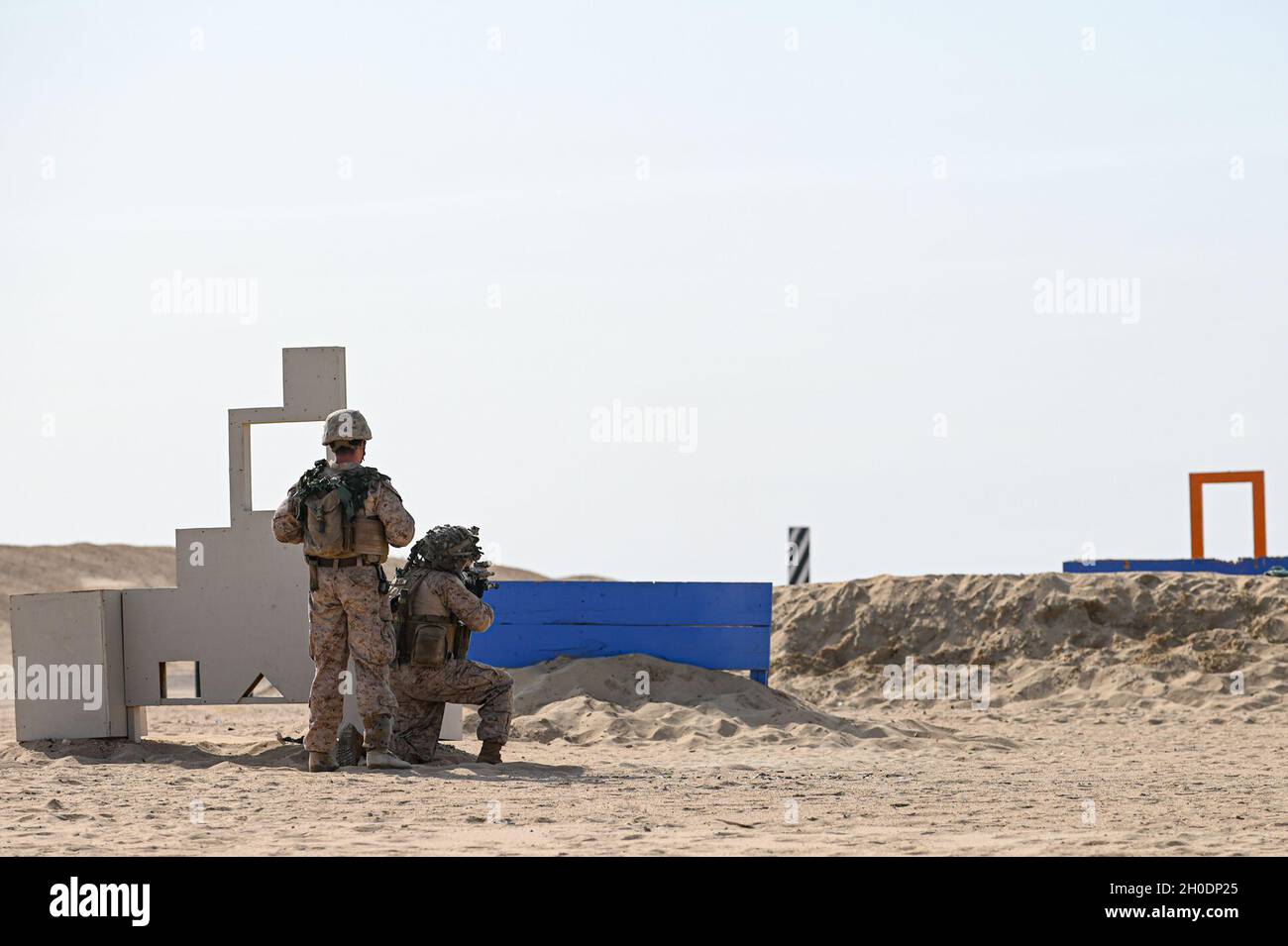 U.S. Marine Corps Sgt. Anthony Palmer, left, a squad leader, observes ...
