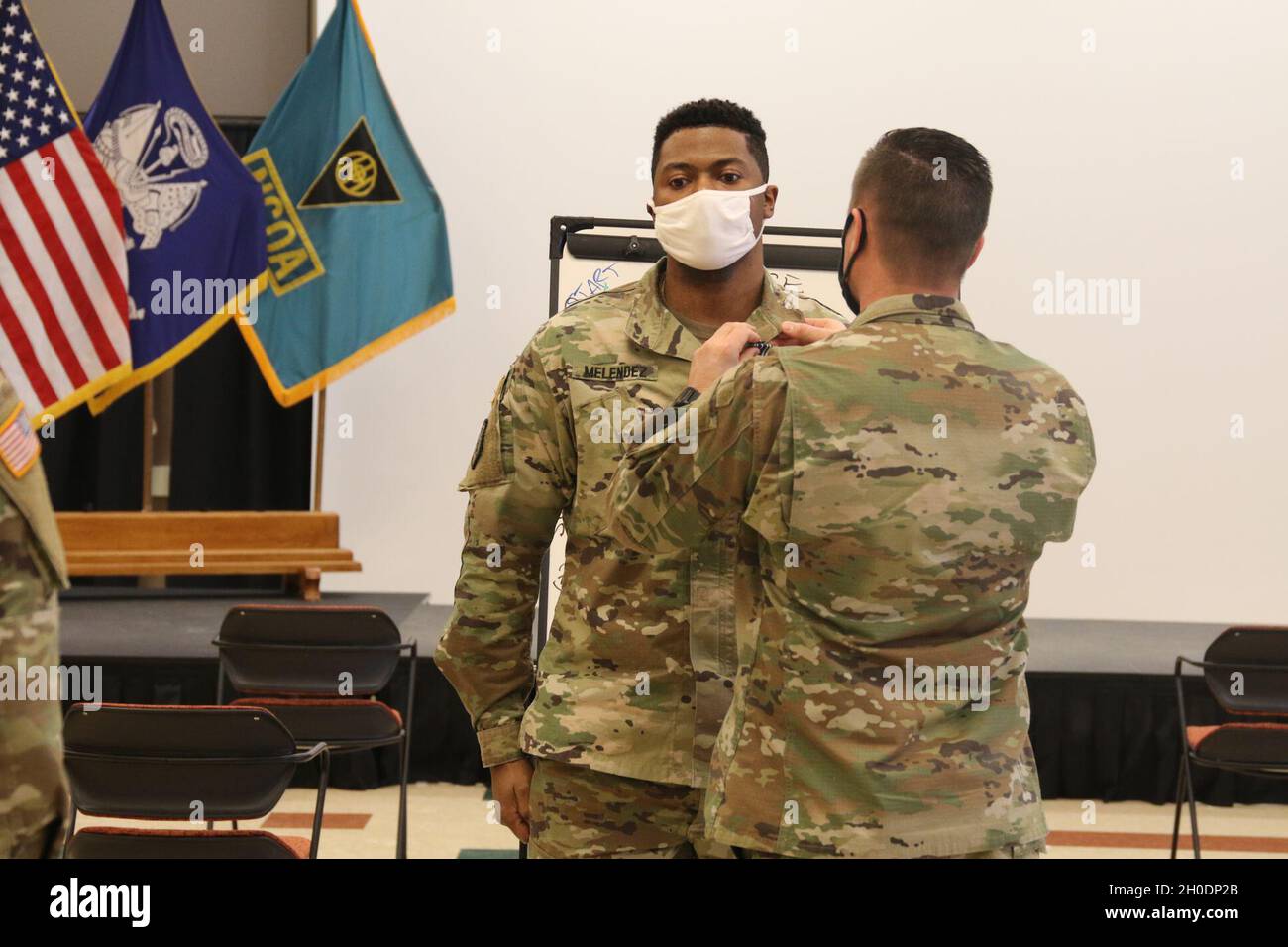 CSM pins the Army Achievement Medal to SSG Melendez for winning FY21 ...