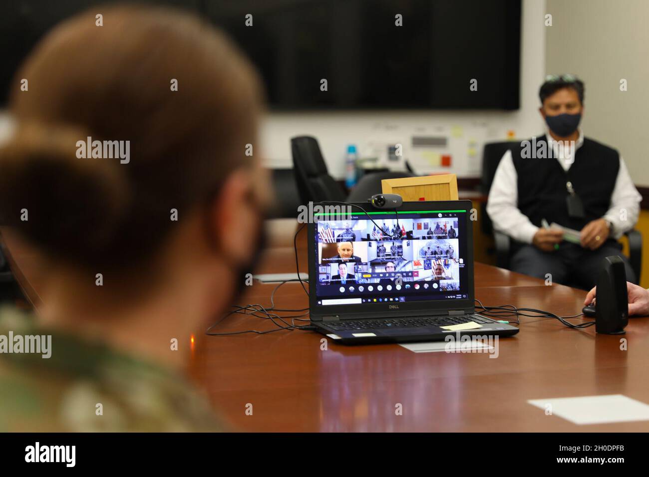 Sgt. 1st Class Morgan M. Smith watches a Microsoft Teams video chat ...