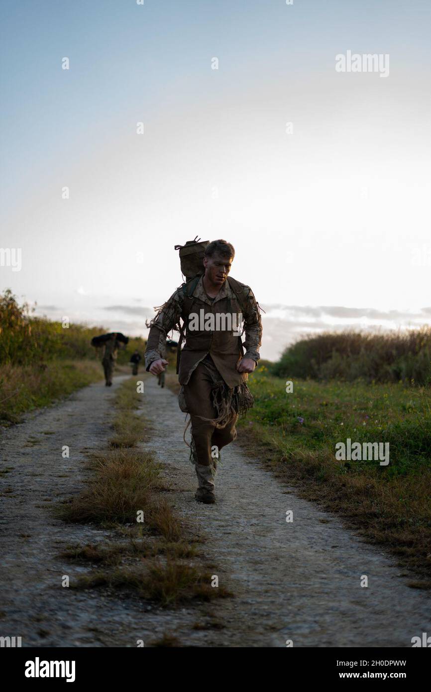 U.S. Marine Corps Lance Cpl. Eric Buie, a reconnaissance Marine with 3d ...