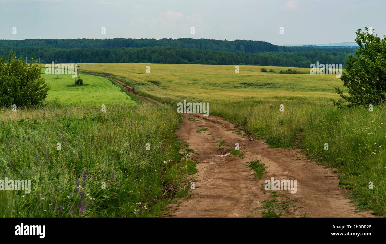 Man walking down dirt road hi-res stock photography and images - Alamy