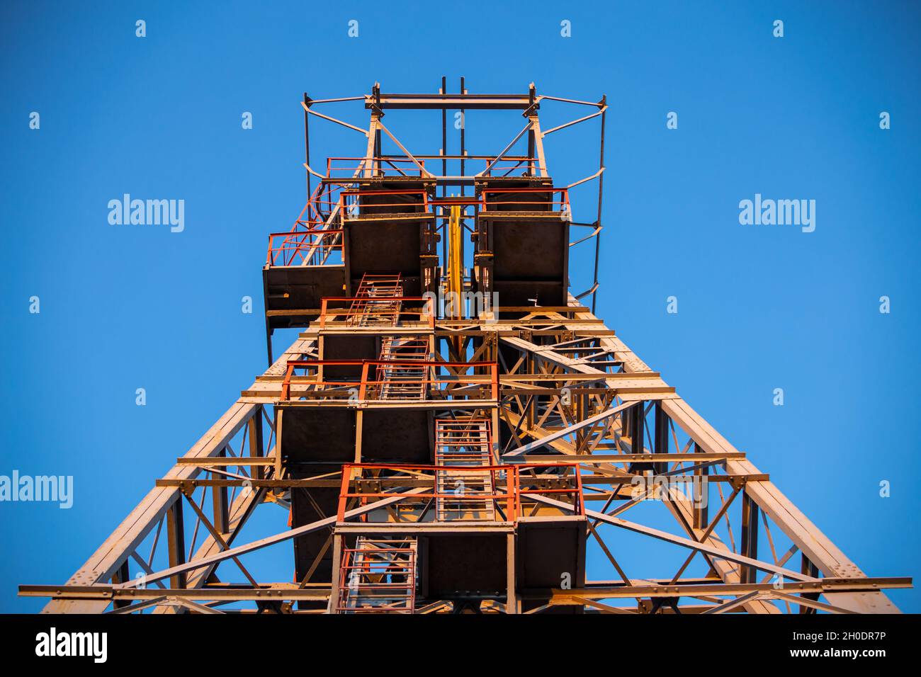 The elevator of the hoist shaft in the black coal mine. Coal mine hoist ...
