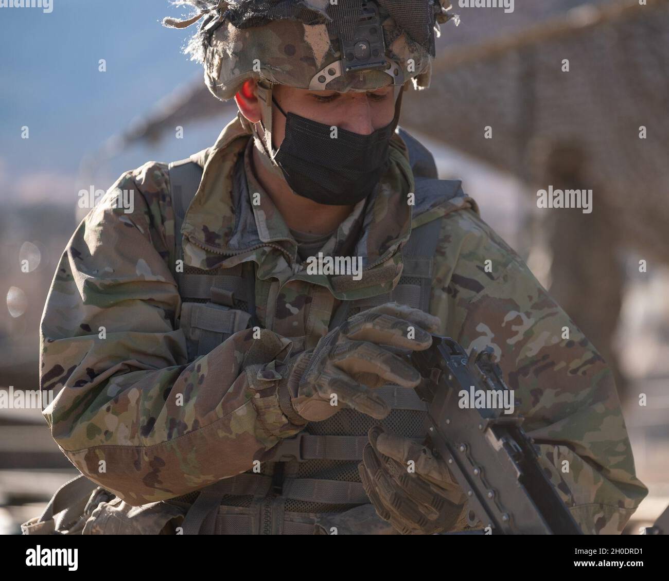 Pfc. James Moore, an Infantryman assigned to Charlie Company, 4th ...
