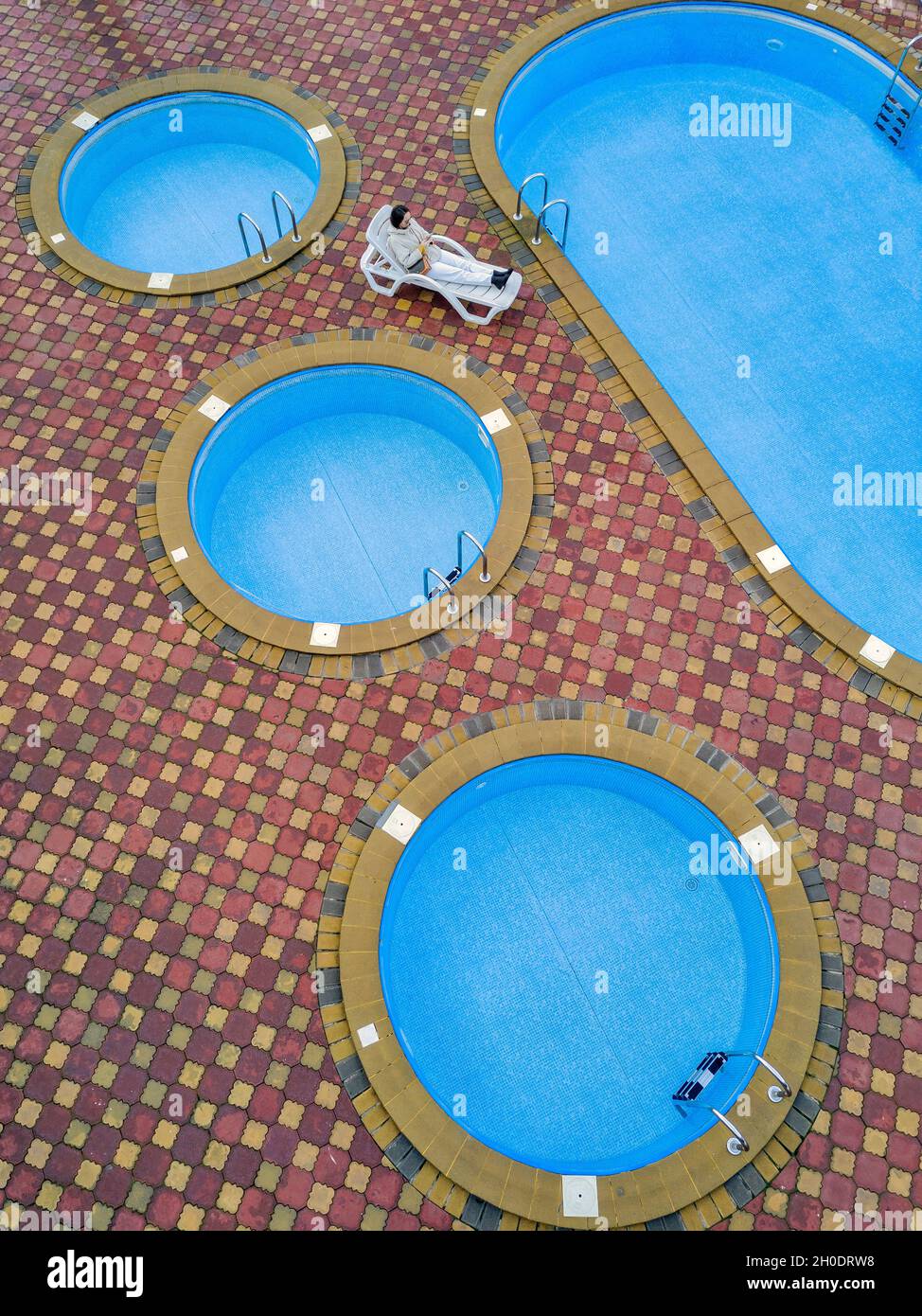 Woman swimming pool aerial view hi-res stock photography and images - Alamy