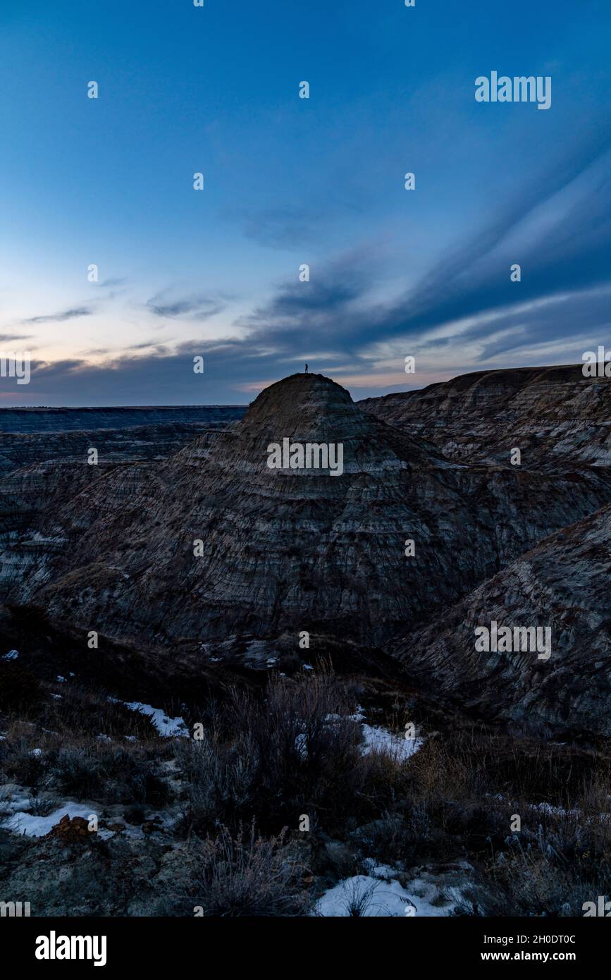 Runner On Large Desert Mound During Sunset Stock Photo - Alamy