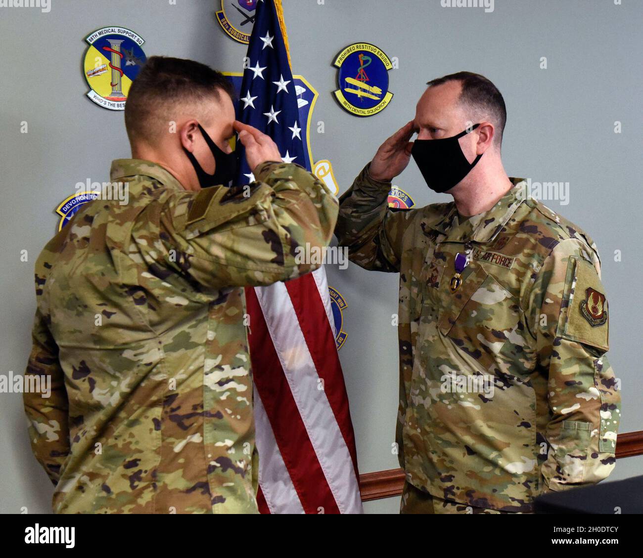 U.S. Air Force Senior Master Sgt. Bruce Haskin, right, a superintendent ...