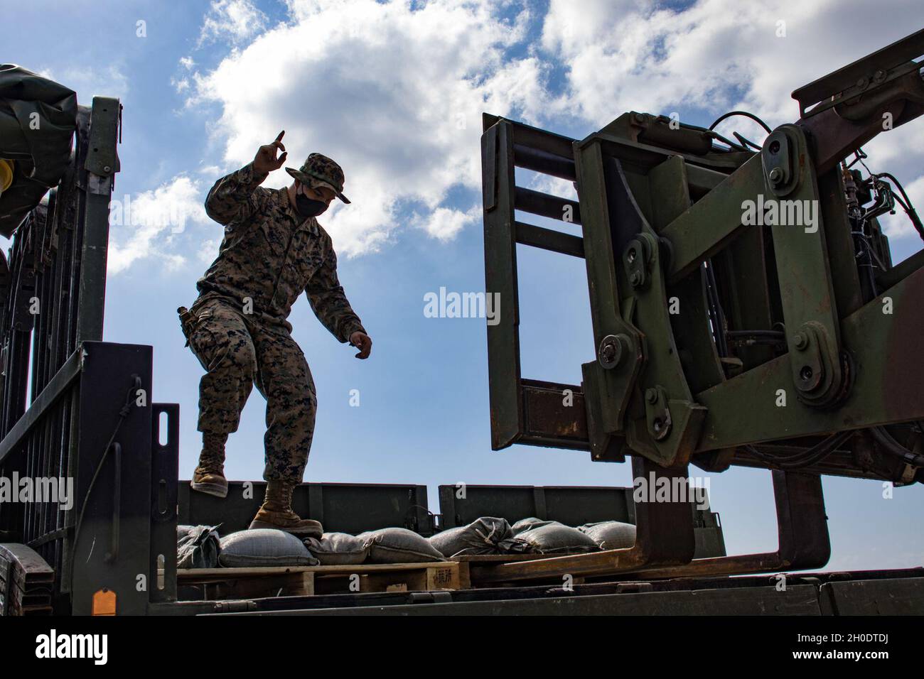 A U.S. Marine with Combat Logistics Battalion (CLB) 31, 31st Marine ...