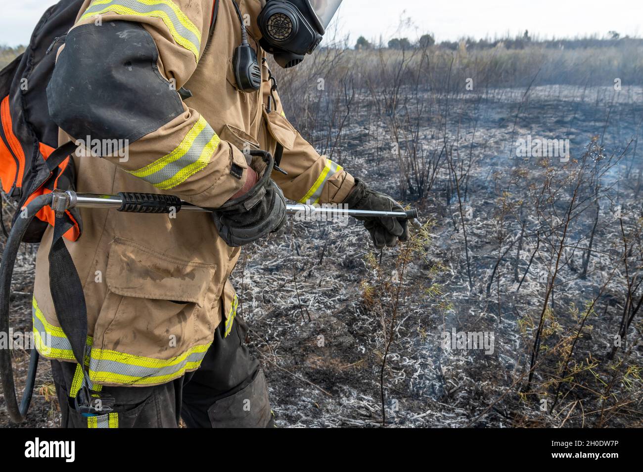 Fire service putting out wildfire hi-res stock photography and images ...