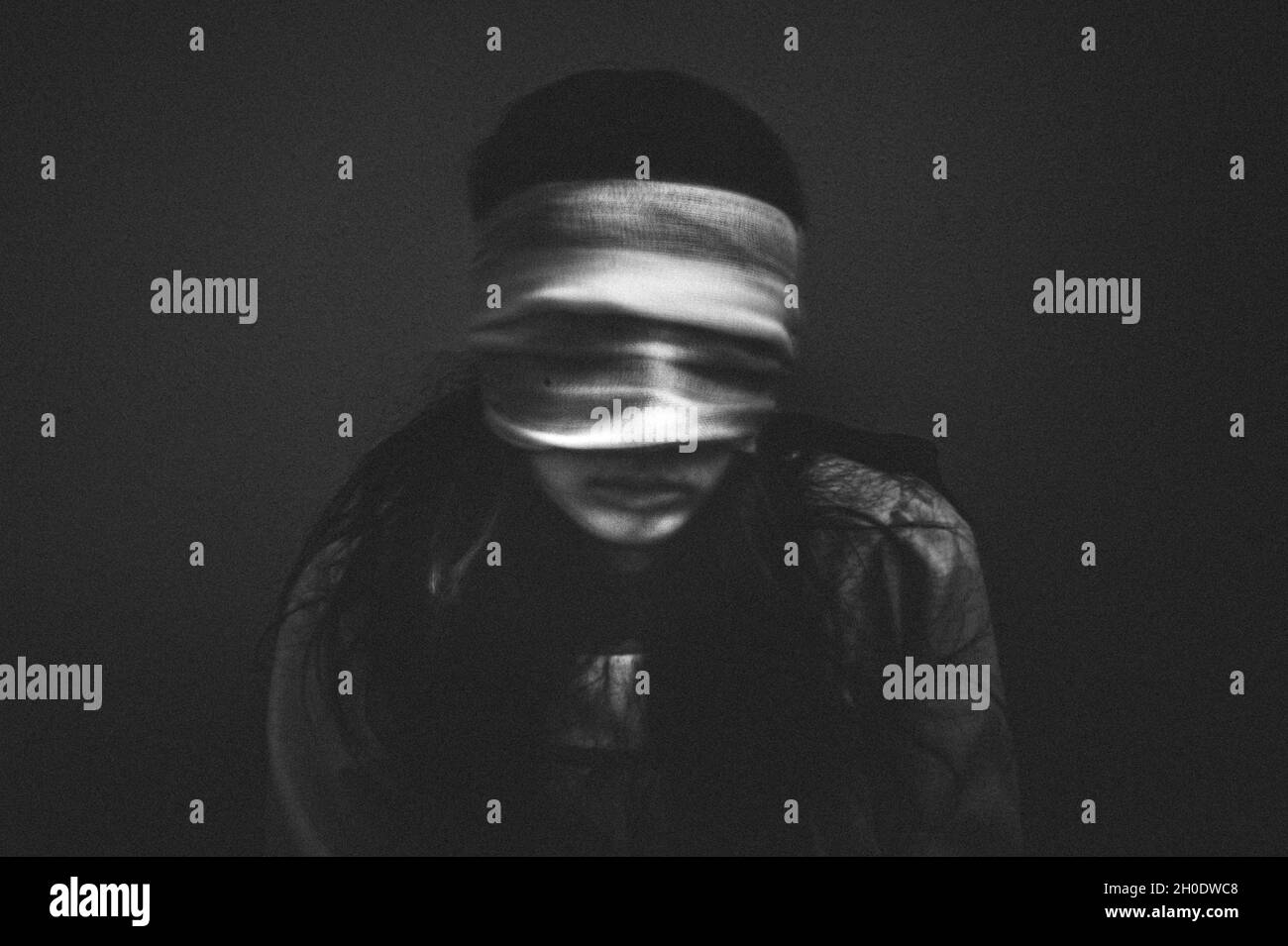 Portrait of creepy girl with bandages over her eyes Stock Photo - Alamy