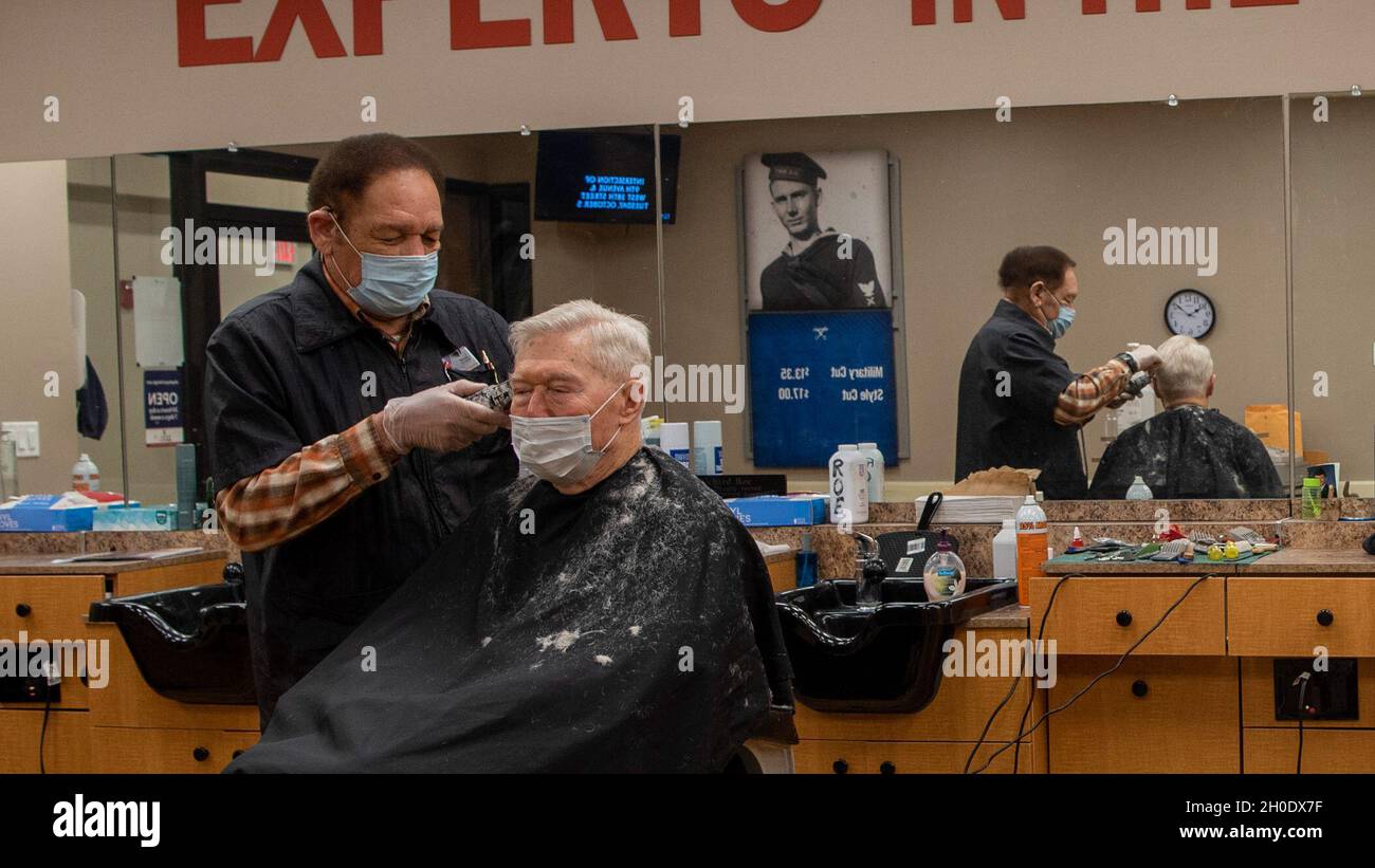 Richard Roe cuts the hair of a customer Feb. 5 at the Wright-Patterson ...