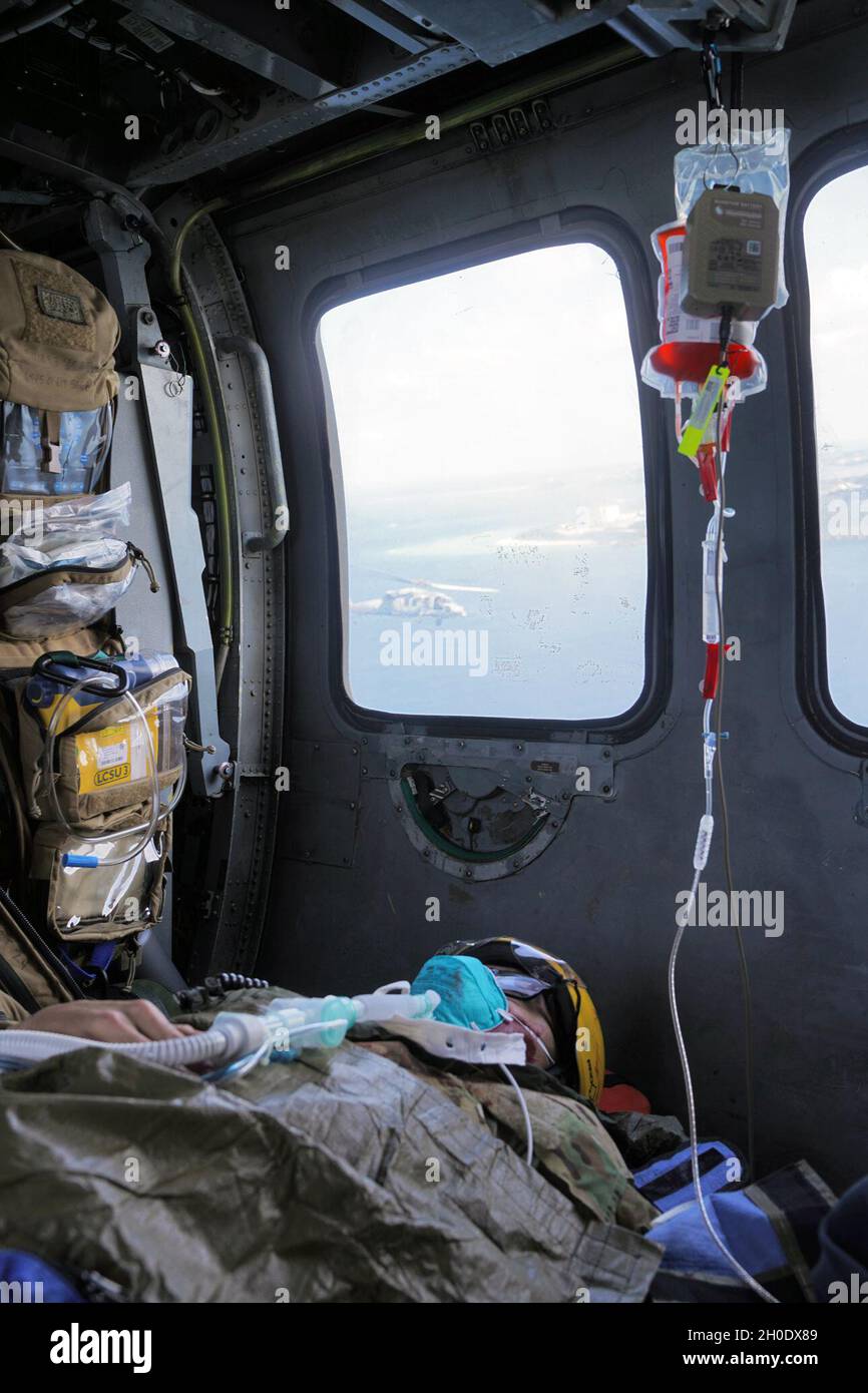 A pair of U.S. Navy MH-60S Seahawks medevac scenario role-players ...
