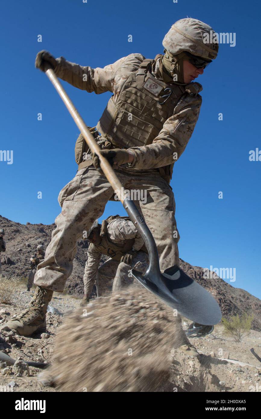 U.S. Marine Corps Lance Cpl. Dylan Rusho, a field artillery cannoneer ...