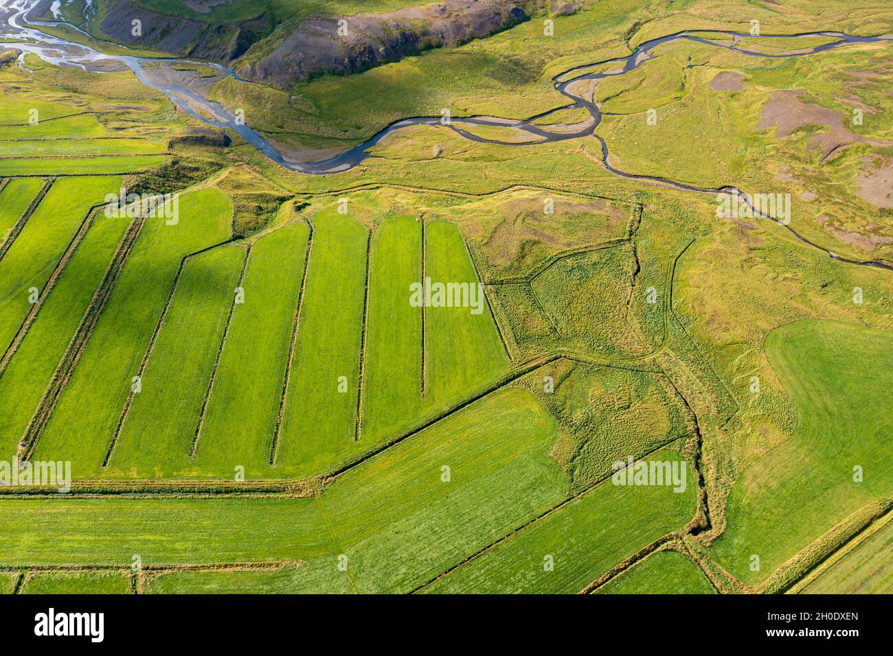 A river is flowing by rural land, seen from above Stock Photo - Alamy