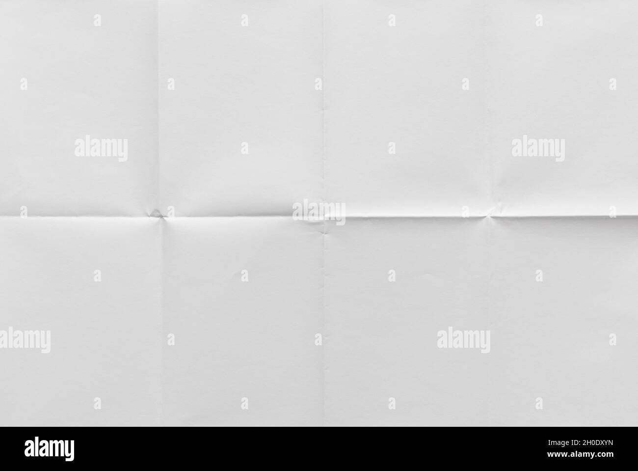 Close-up of sheet paper folded in eight, texture background Stock Photo ...