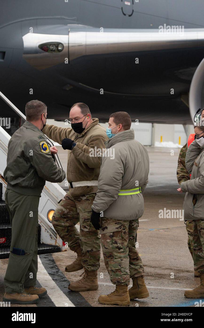 Crew members of the 157th Air Refueling Wing celebrate the 12th and ...
