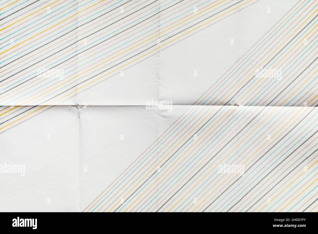 Close-up of sheet paper folded in eight, texture background Stock Photo ...