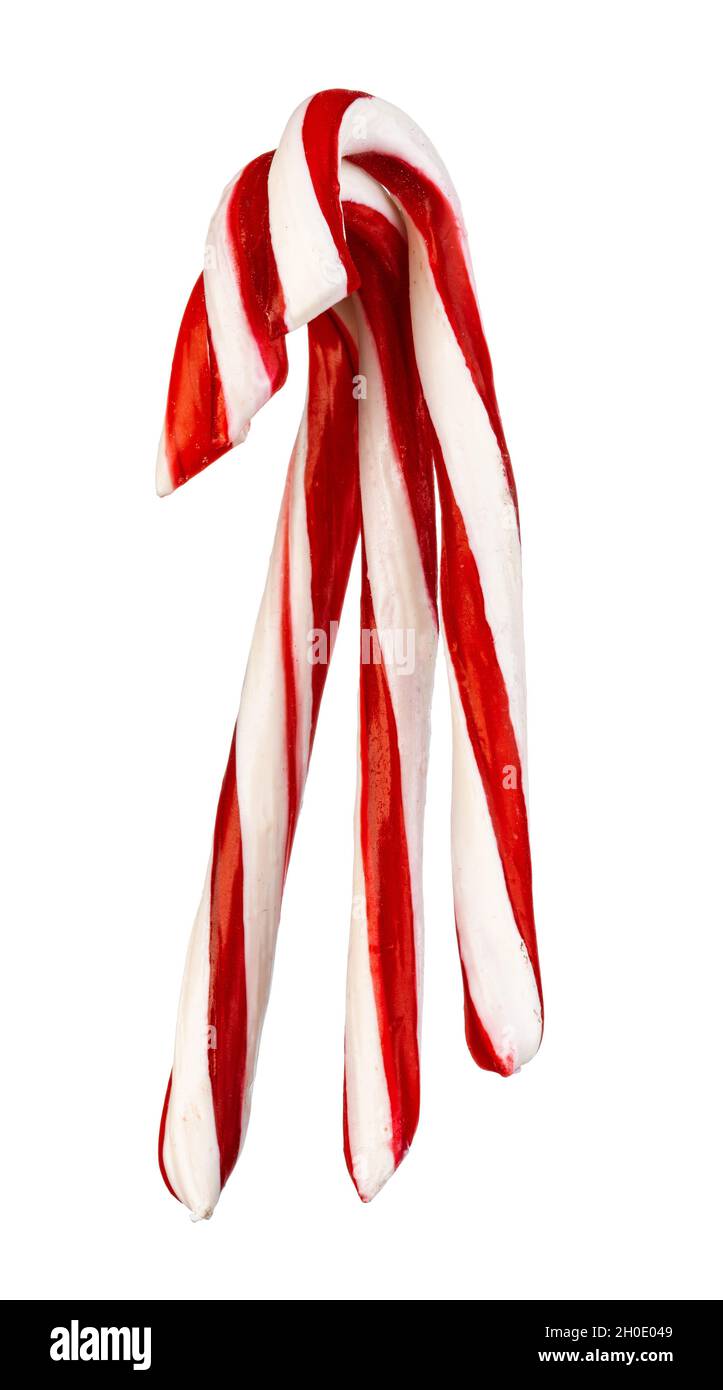 Stack of candy canes isolated on white background Stock Photo - Alamy