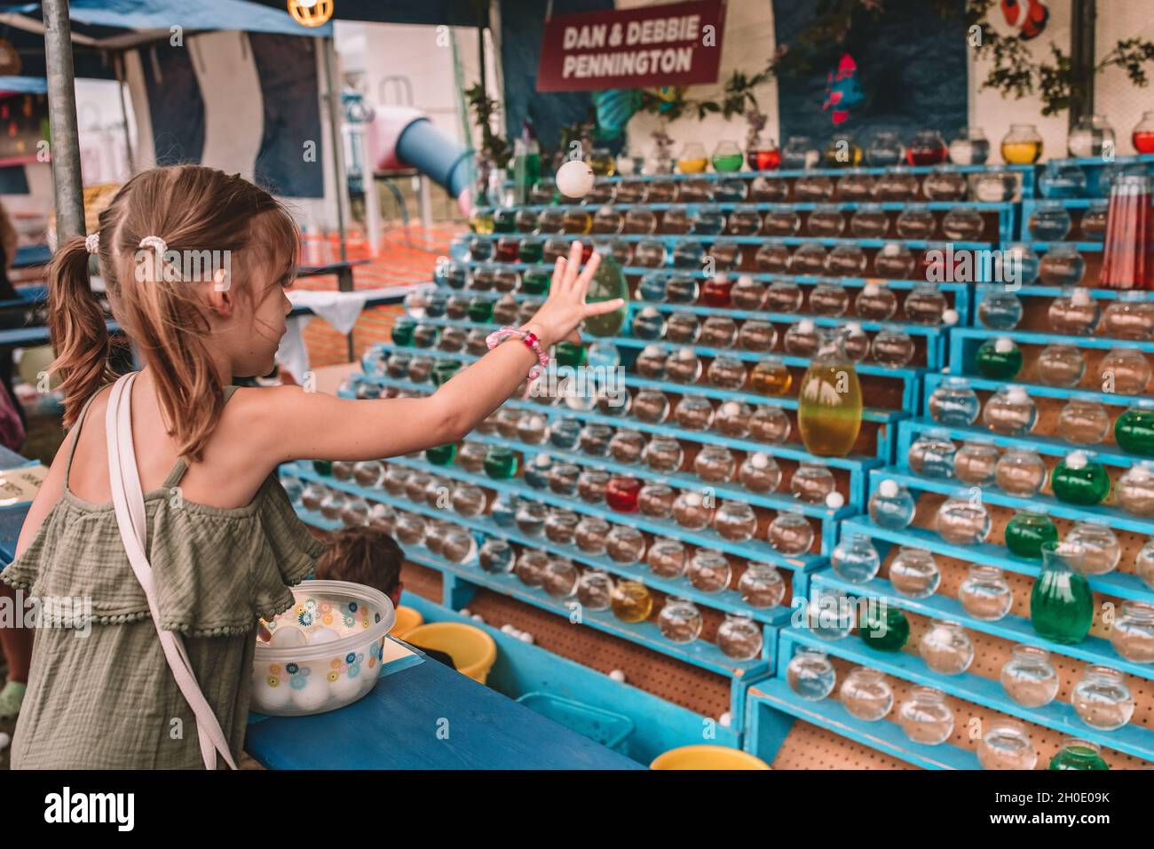 summer nights at the festival trying to win a fish Stock Photo - Alamy