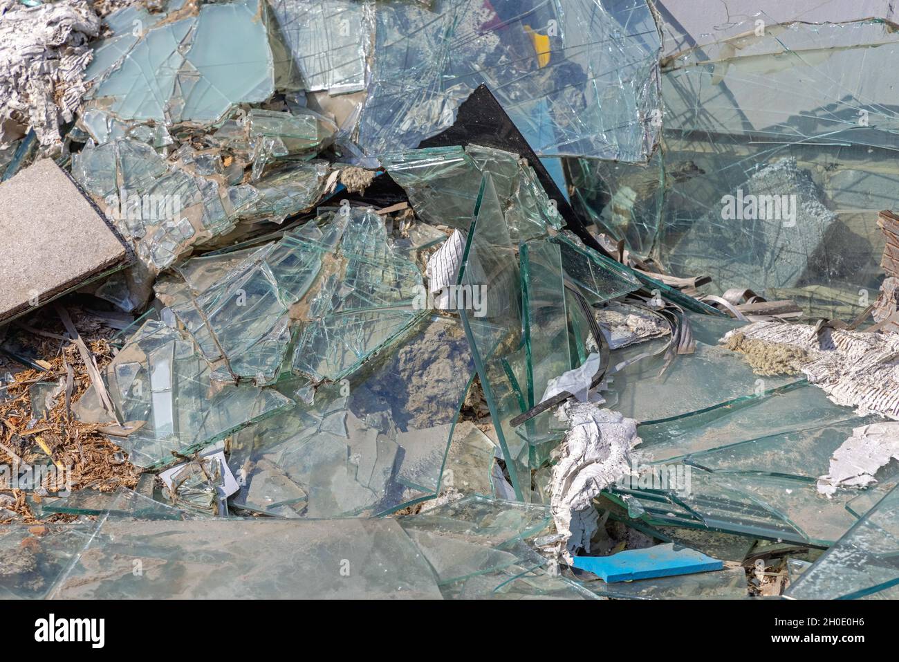 Big Bunch of Broken Glass Windows Debris Damage Stock Photo - Alamy