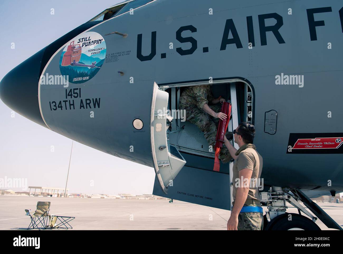 A U.S. Air Force KC-135 Stratotanker pilot and crew chief, assigned to ...