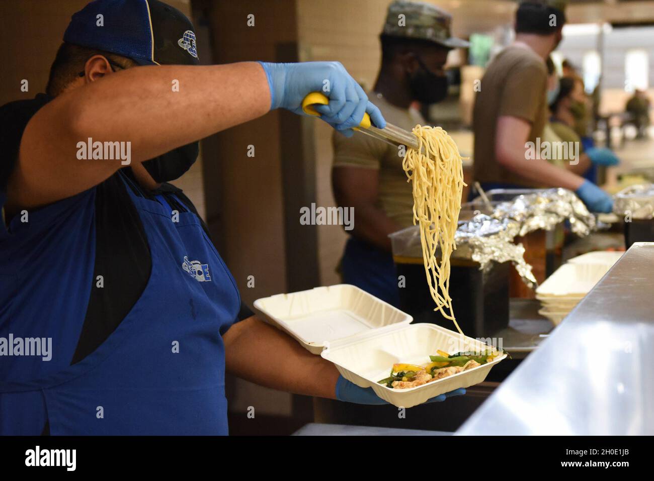 From left, Andrew Suarez, Goodwill Contracting Services line cook ...