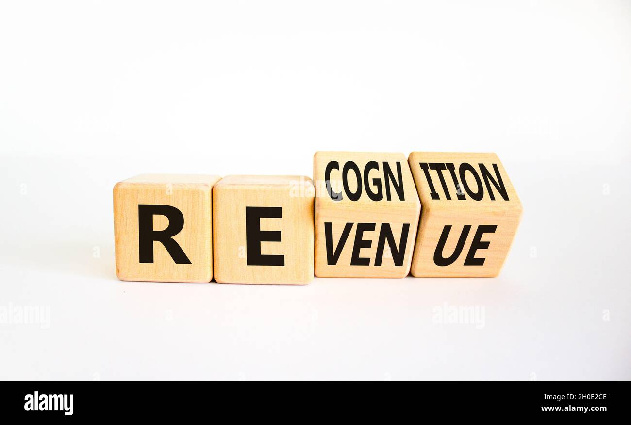 Revenue and recognition symbol. Businessman turned cubes and changed ...