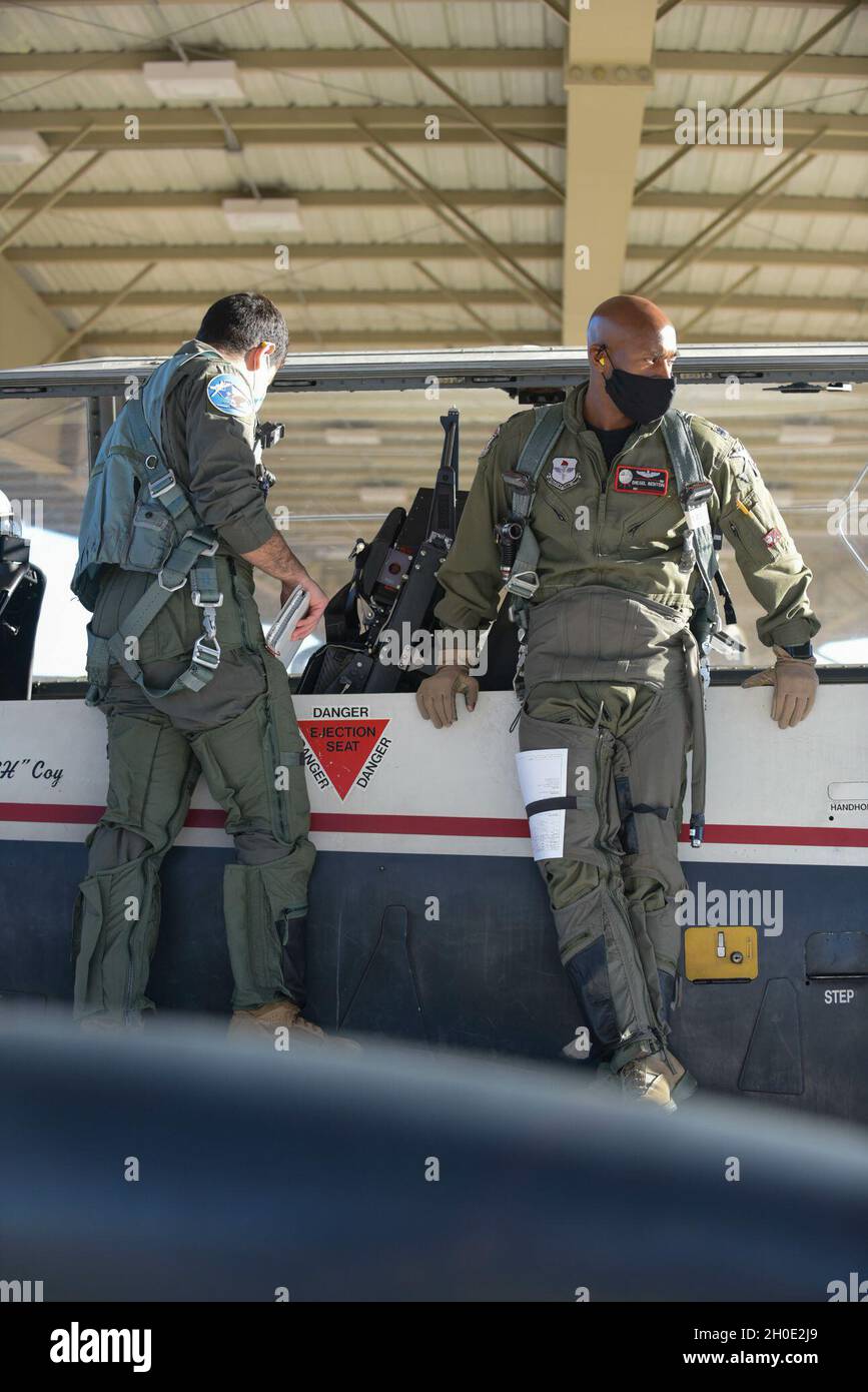 Lt. Col. Julian Benton, 47th Operations Group deputy commander, waits on a T-6 Texan II wing ...