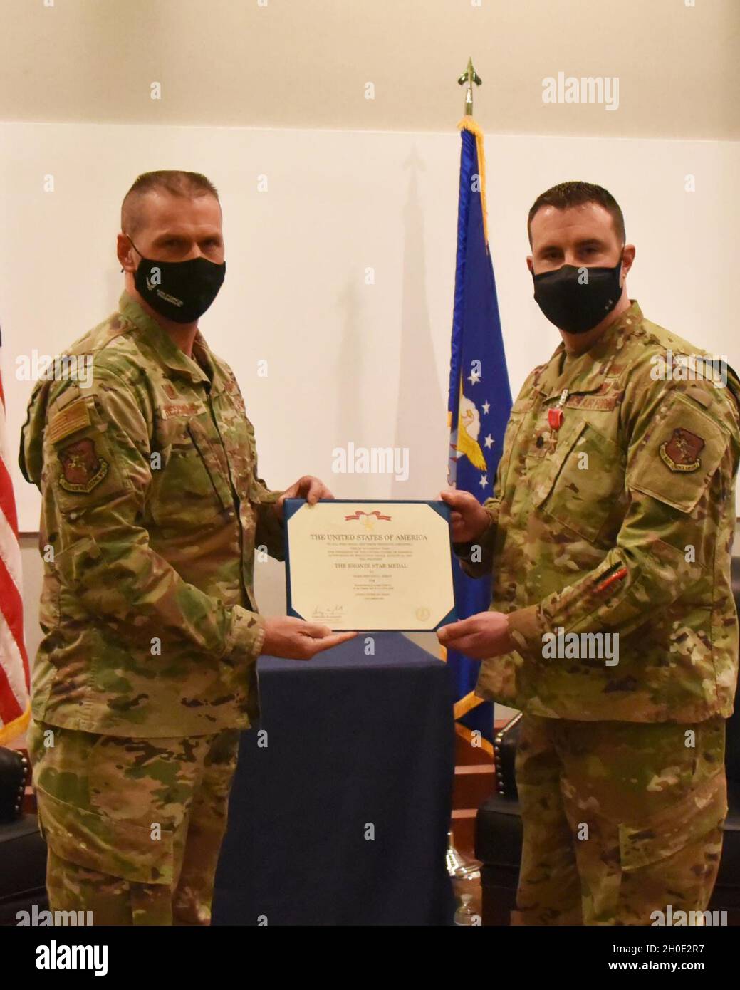Col. Phil Heseltine, 931st Air Refueling Wing commander, presents the ...