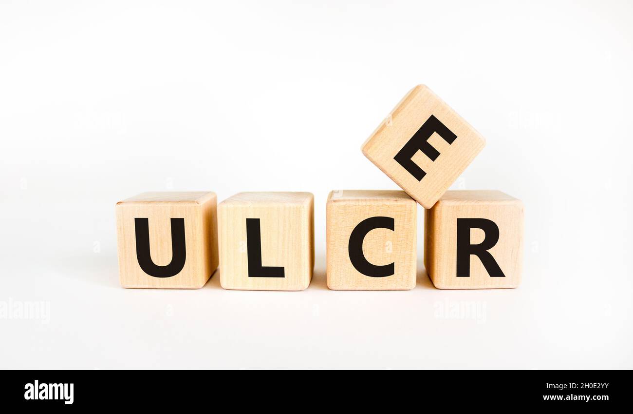 Stomach ulcer symbol. Wooden cubes with the word 'ulcer'. Beautiful ...