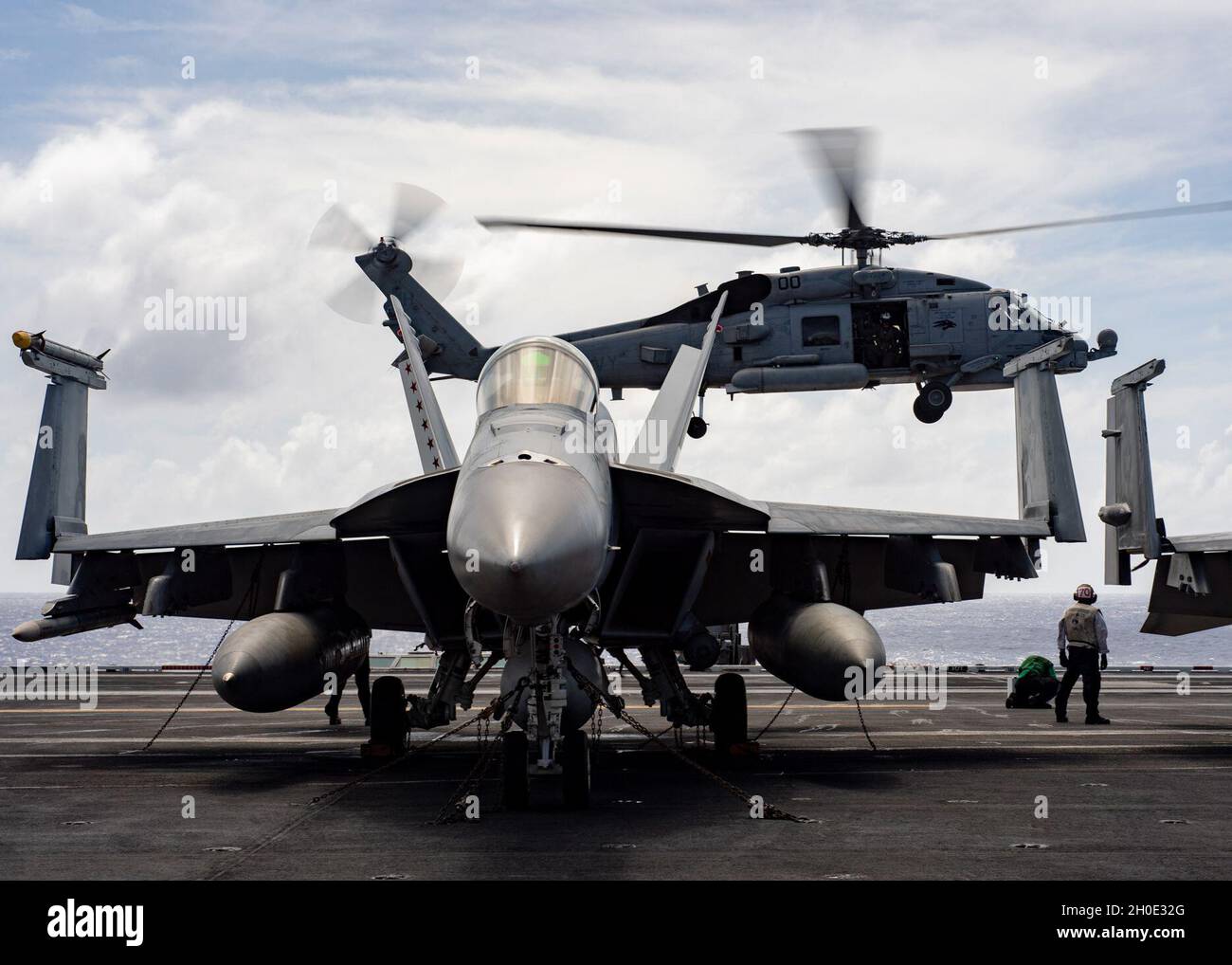 PACIFIC OCEAN (Feb. 6, 2021) – An MH-60R Sea Hawk, assigned to the ...