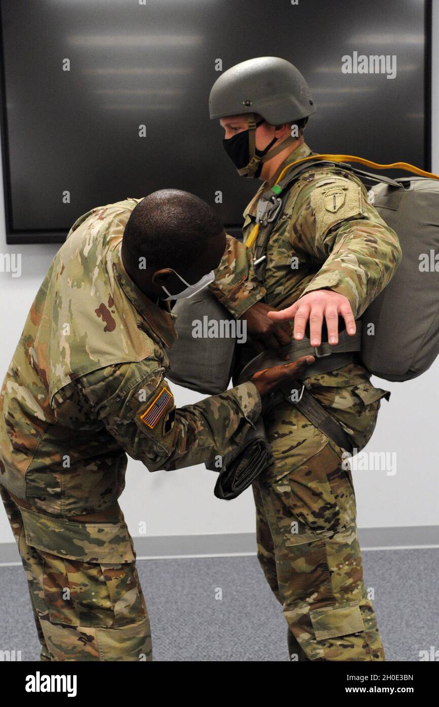 U.S. Army Sgt. 1st Class Larry Carter, a jumpmaster assigned to the ...