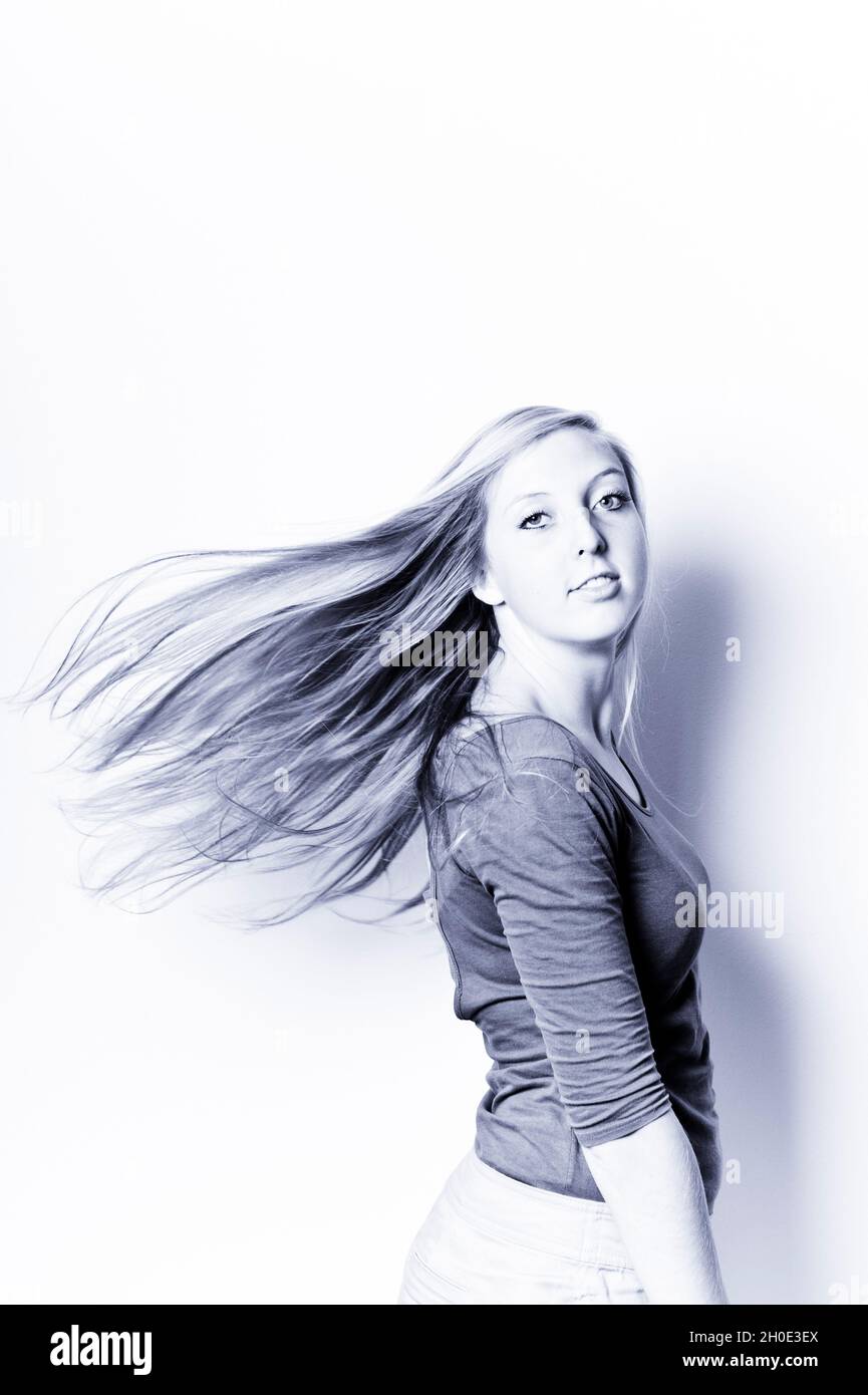 Woman moving hair hi-res stock photography and images - Alamy