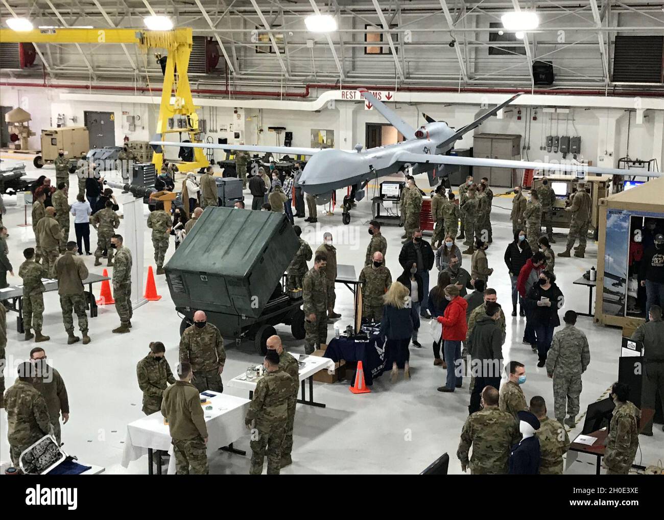 Members of the 174th Attack Wing speak with potential recruits during a ...