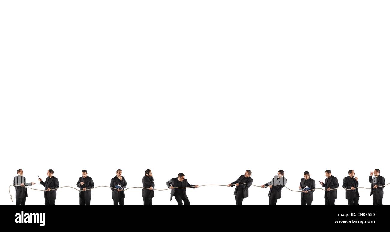 Team competing in tug of war. While some strive and do their duty ...