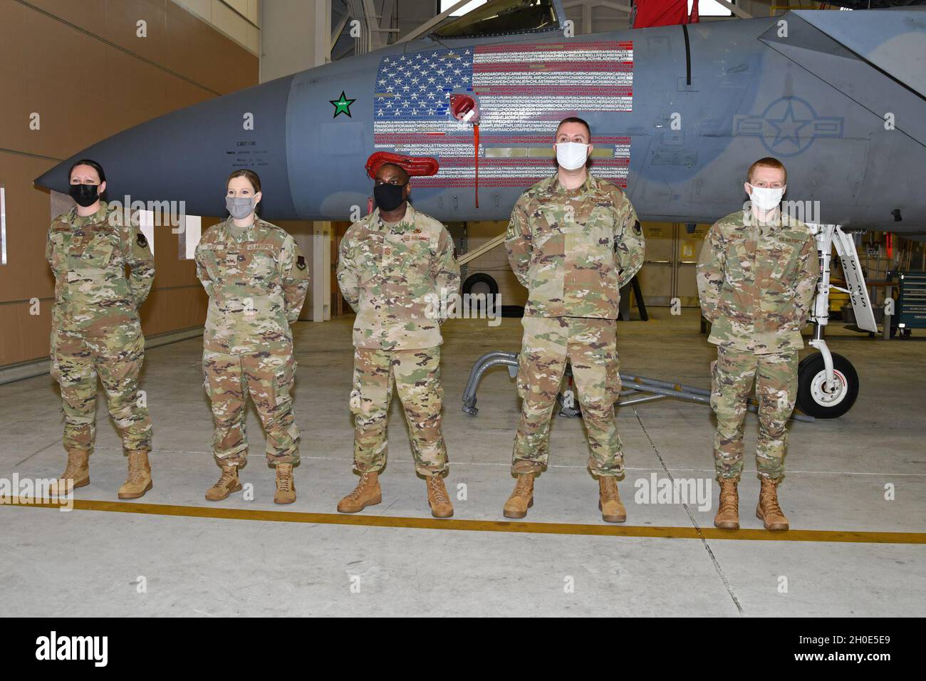 U.S. Air Force Chief Master Sgt. Maurice L. Williams, center, command ...