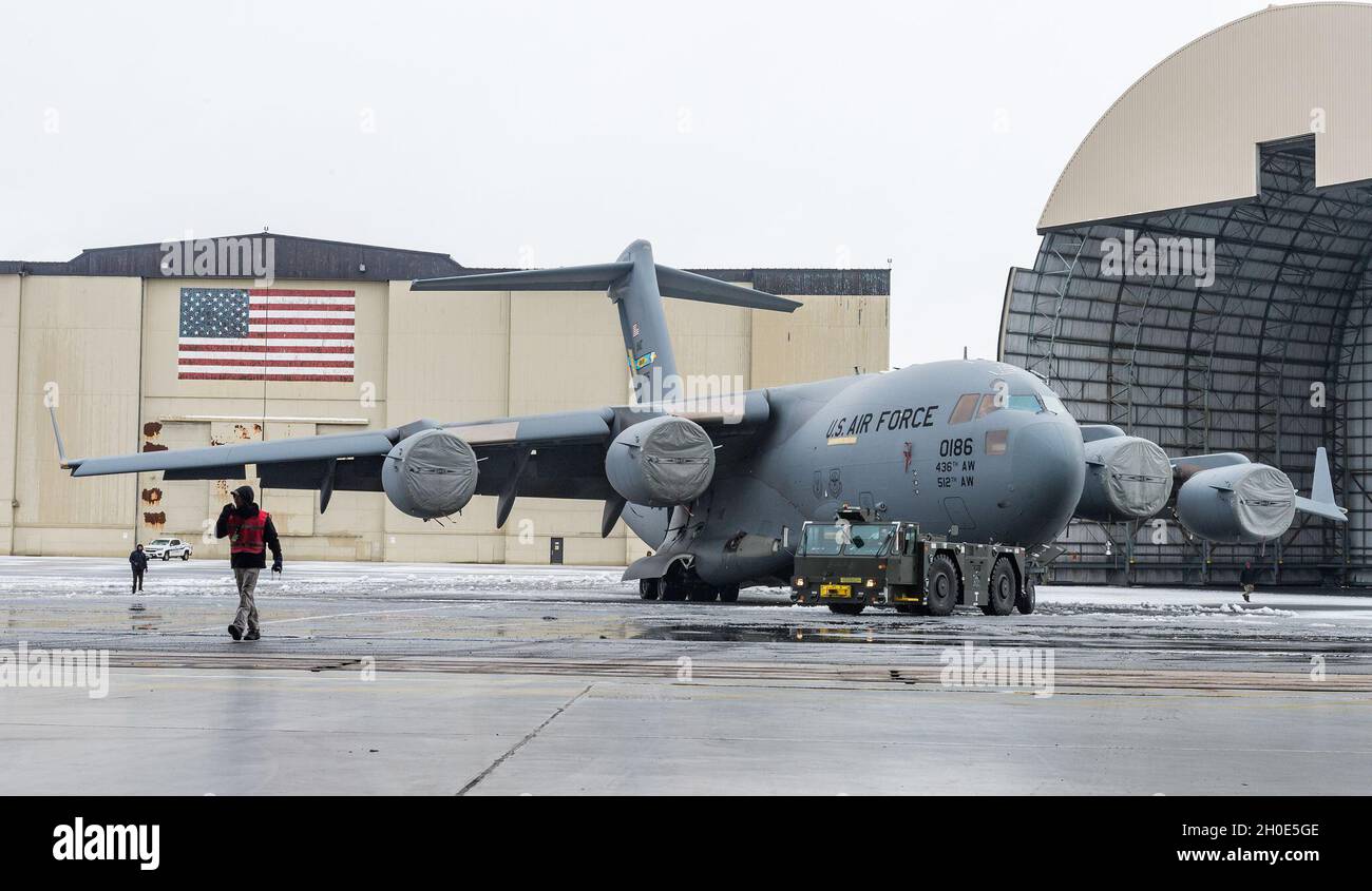 A maintenance tow team from the 736th Aircraft Maintenance Squadron ...
