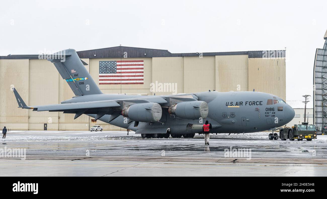 A maintenance tow team from the 736th Aircraft Maintenance Squadron ...