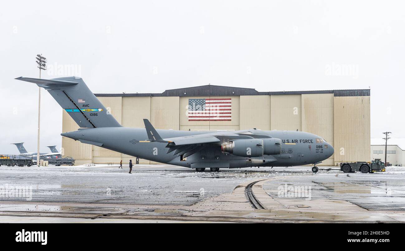 A maintenance tow team from the 736th Aircraft Maintenance Squadron ...