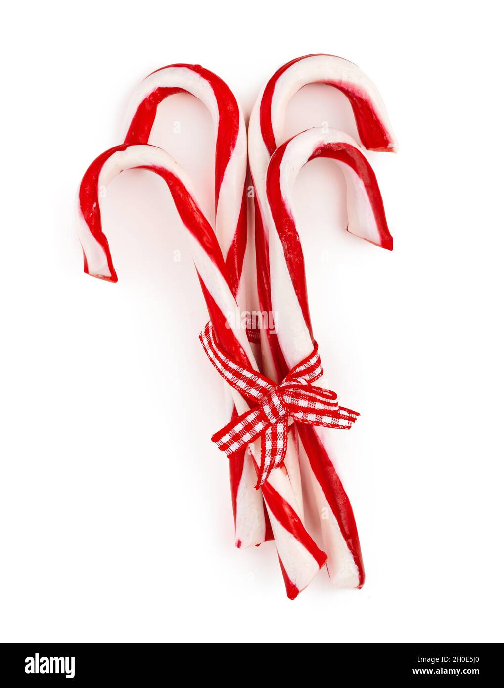 Stack of candy canes isolated on white background Stock Photo - Alamy