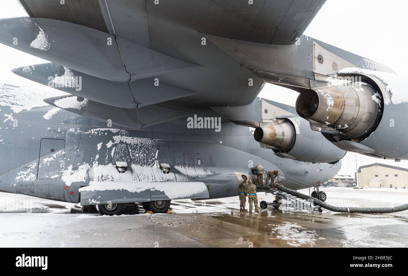 Maintainers from the 736th Aircraft Maintenance Squadron, walk toward a ...